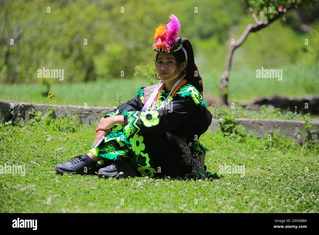 Portrait image of Kalash tribe girl in tradditional costume from rumbur ...