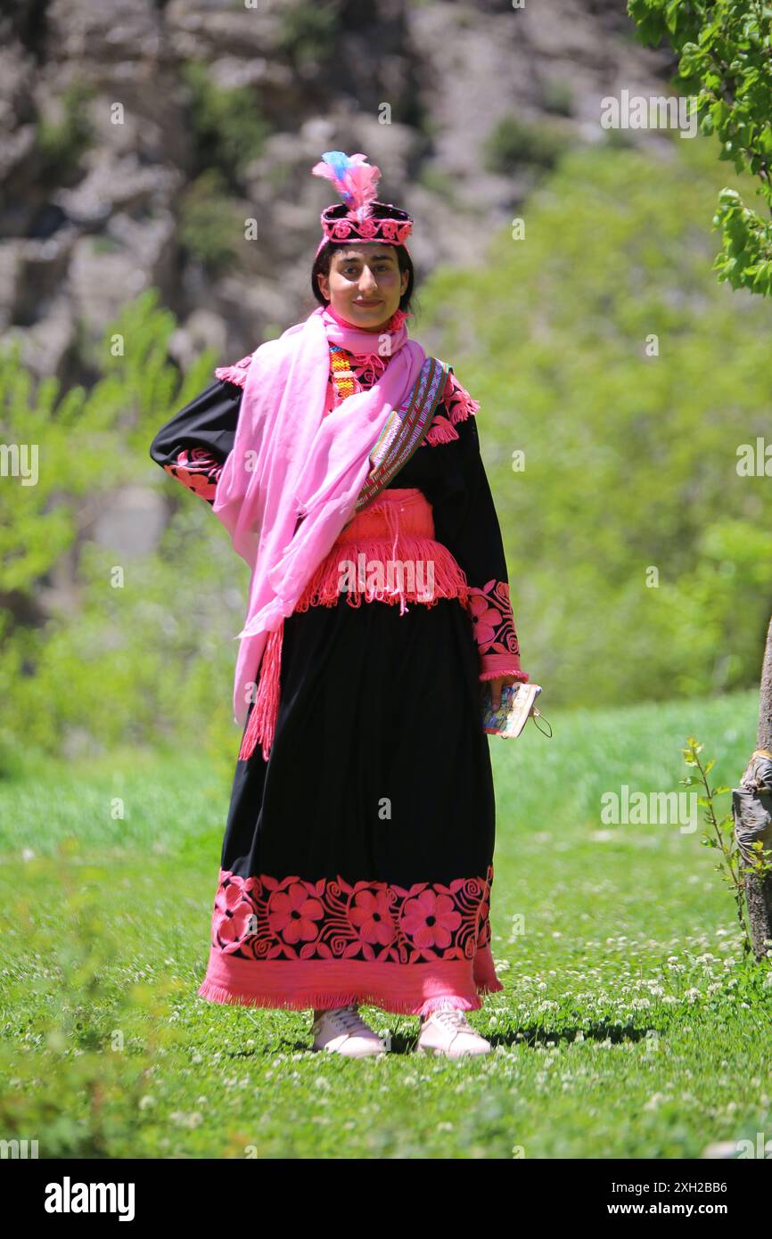 Portrait image of Kalash tribe girl in tradditional costume from rumbur ...