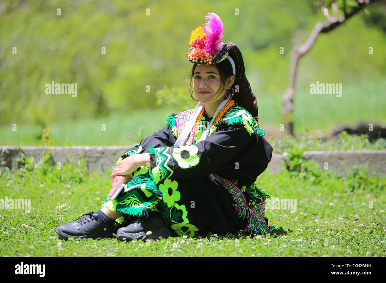 Portrait image of Kalash tribe girl in tradditional costume from rumbur ...