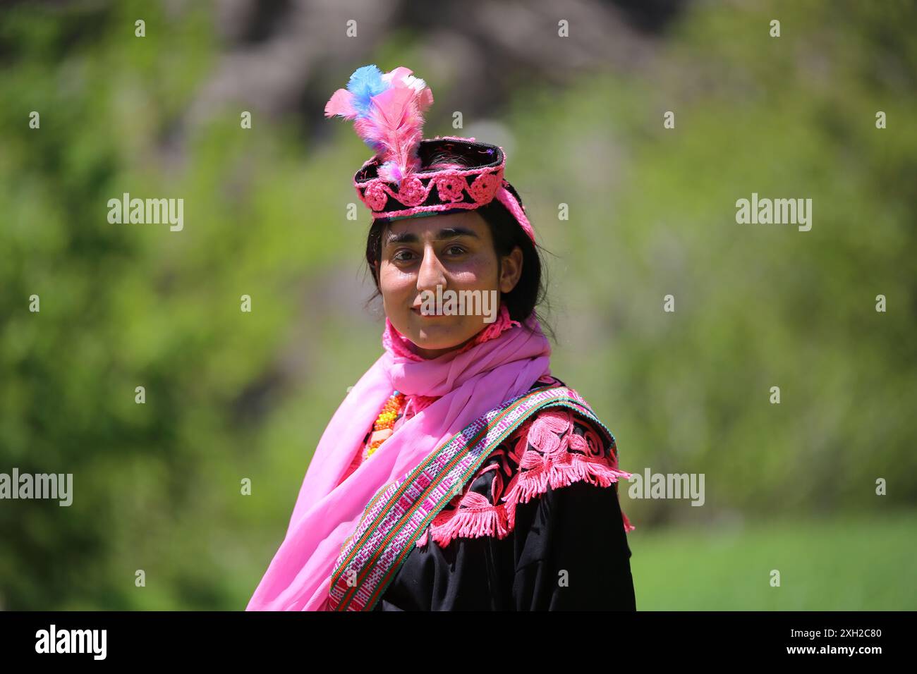 Portrait image of Kalash tribe girl in tradditional costume from rumbur ...