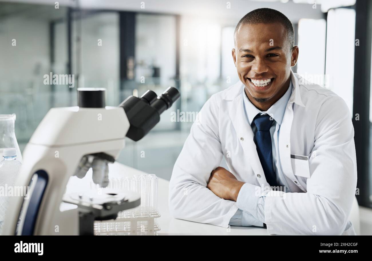 Smile, laboratory and portrait of black man with microscope, medical ...