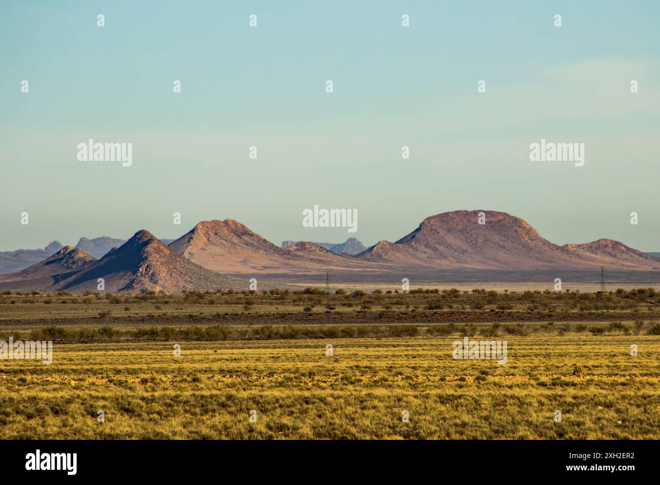 The distant Inselbergs in the arid scrublands of the Northern Cape in ...