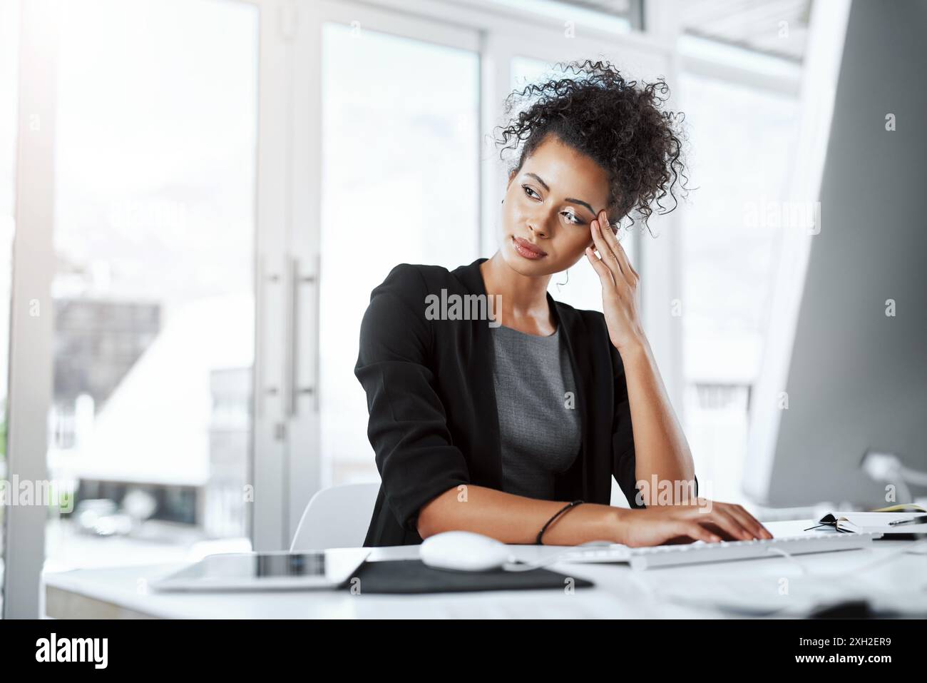 Serious, stress and woman in office, computer and thinking of research ...