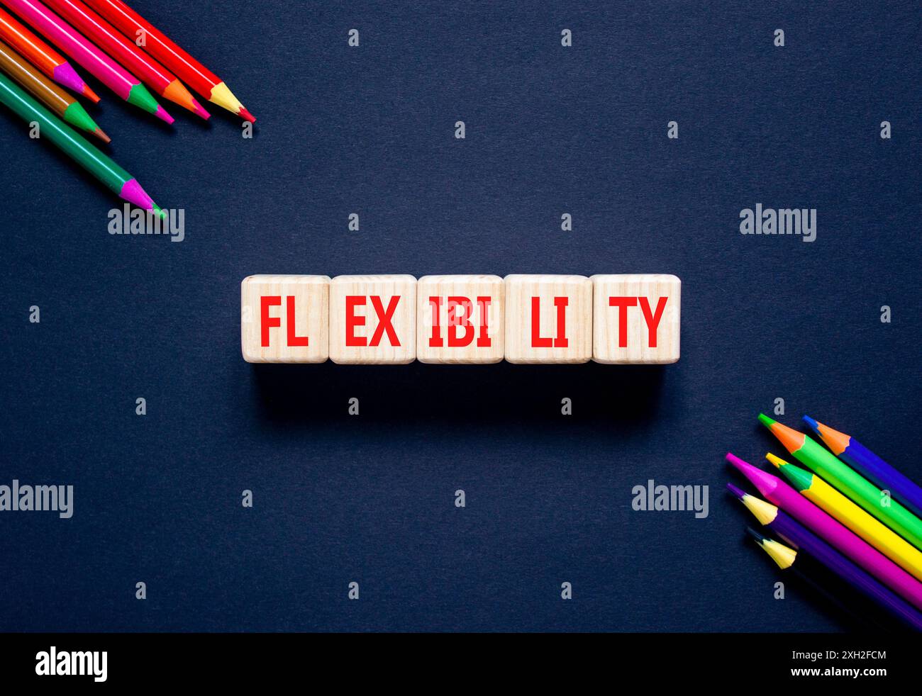 Flexibility symbol. Concept word Flexibility on beautiful wooden cubes ...