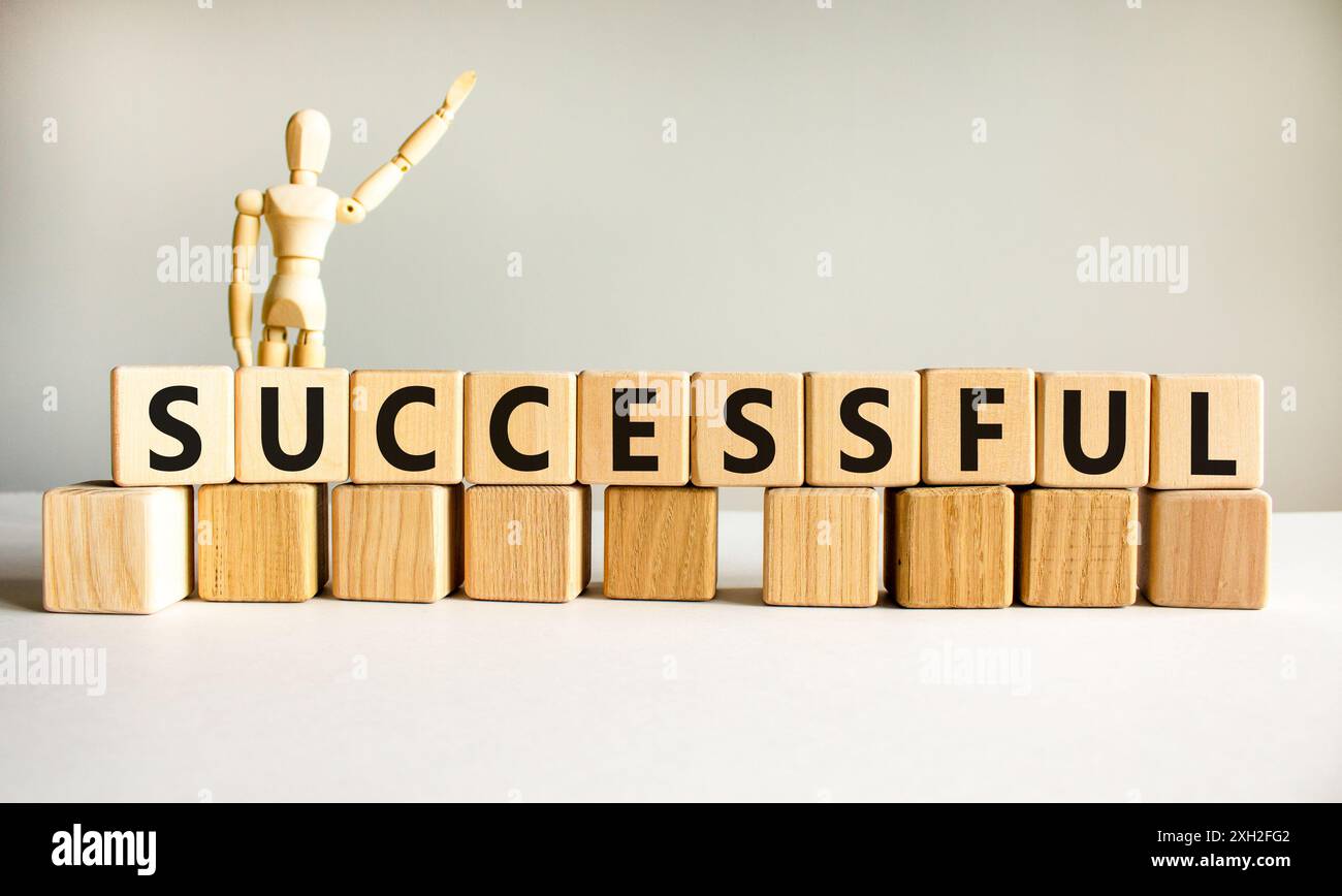 Successful symbol. Concept word Successful on beautiful wooden blocks ...