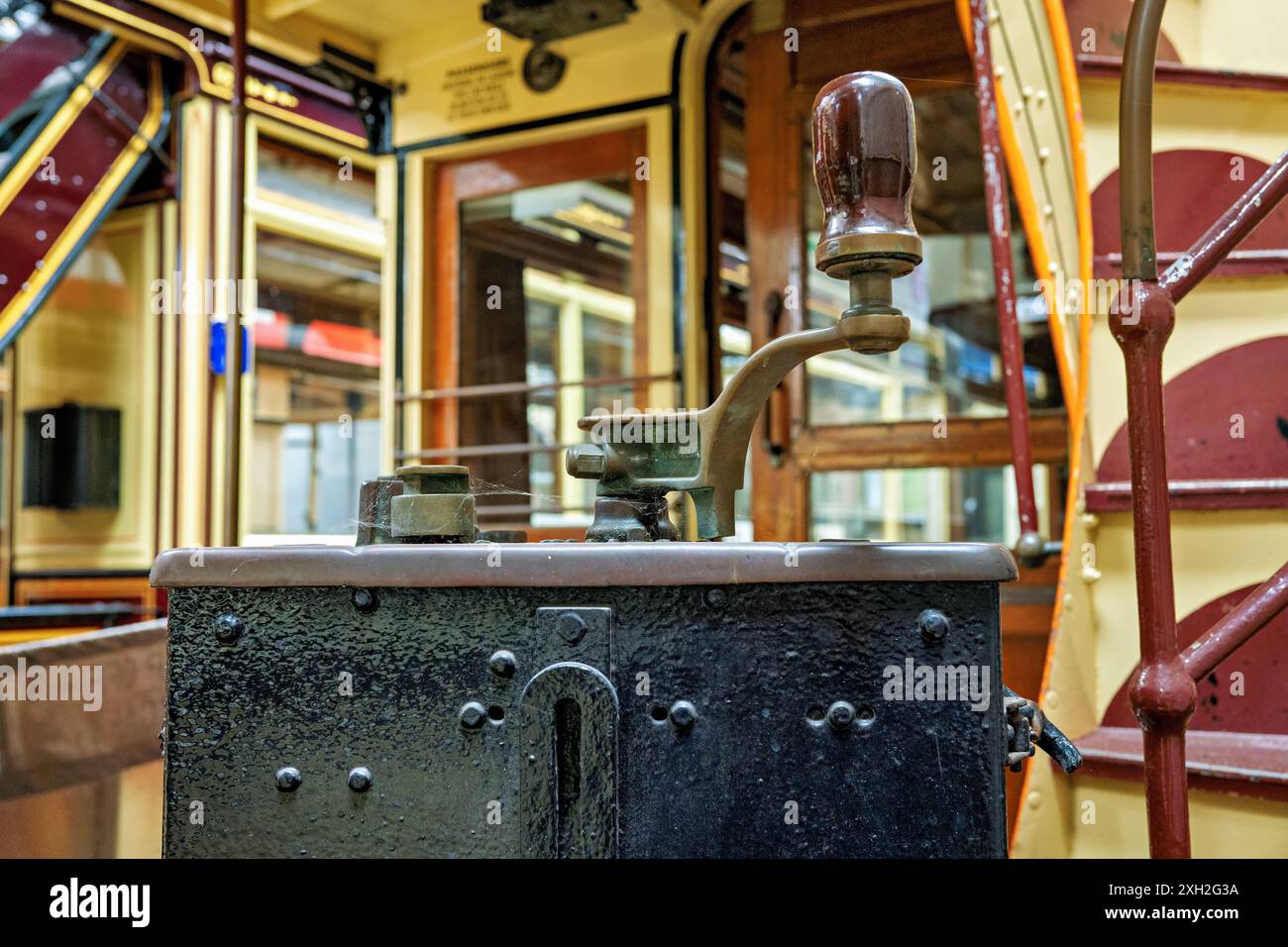 Close-up of vintage tram control panel with intricate levers and brass ...