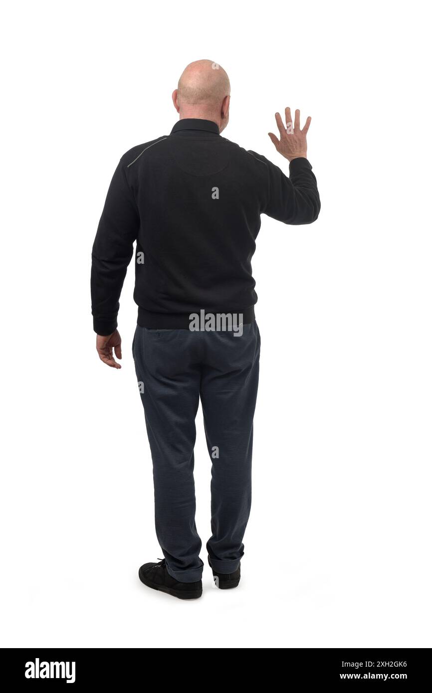 back view of a man standing waving on white background Stock Photo - Alamy