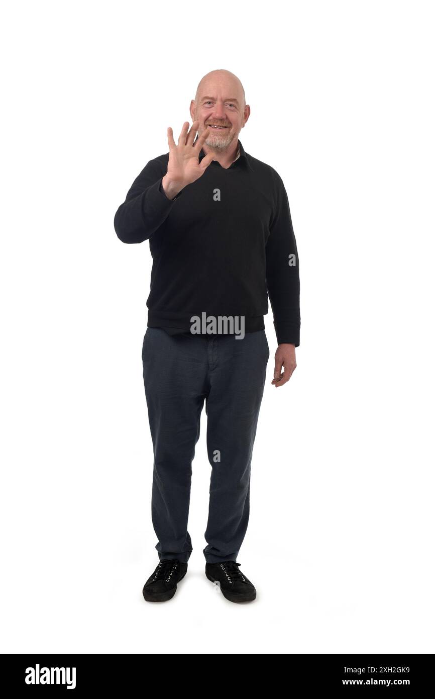 front view of a man standing waving on white background Stock Photo - Alamy