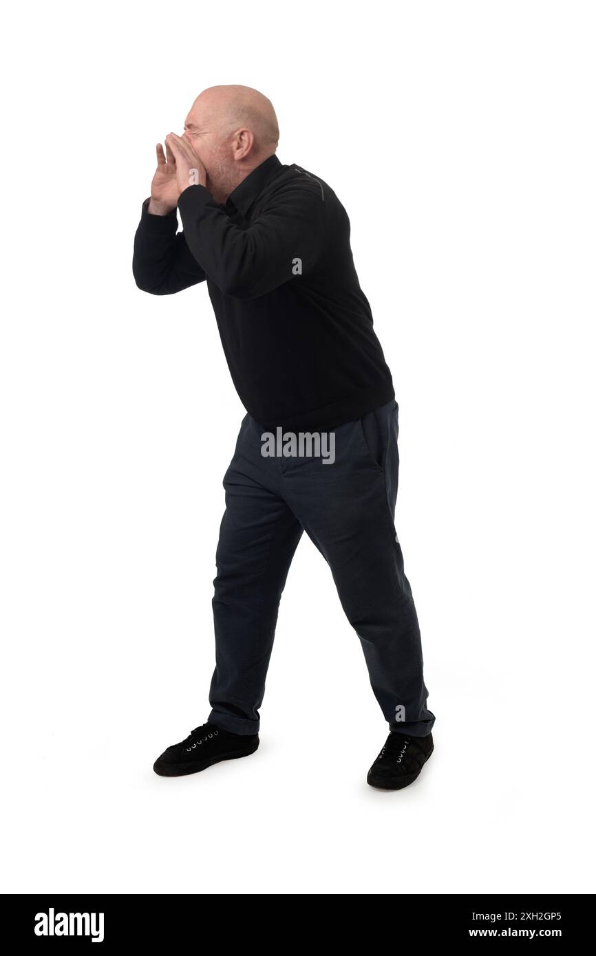 side view of a standing man who is screaming on white background Stock ...