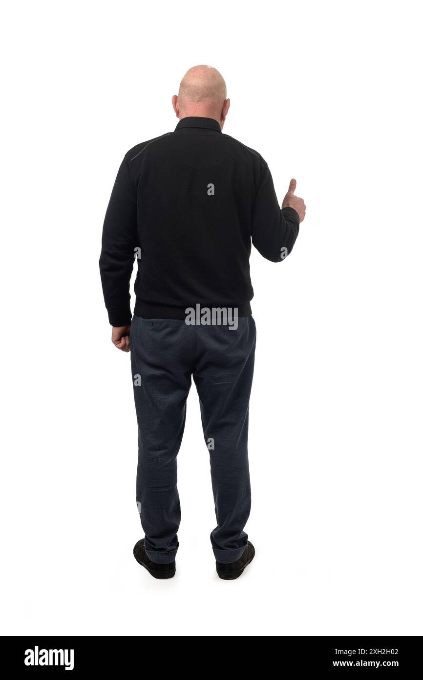 back view of a man showing thumbs up sign on white background Stock ...