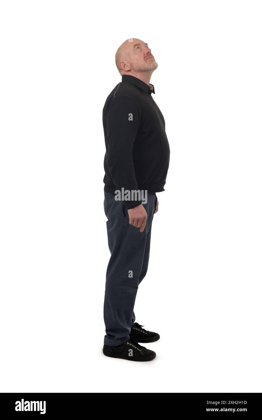 side view view of a man looking up on white background Stock Photo - Alamy