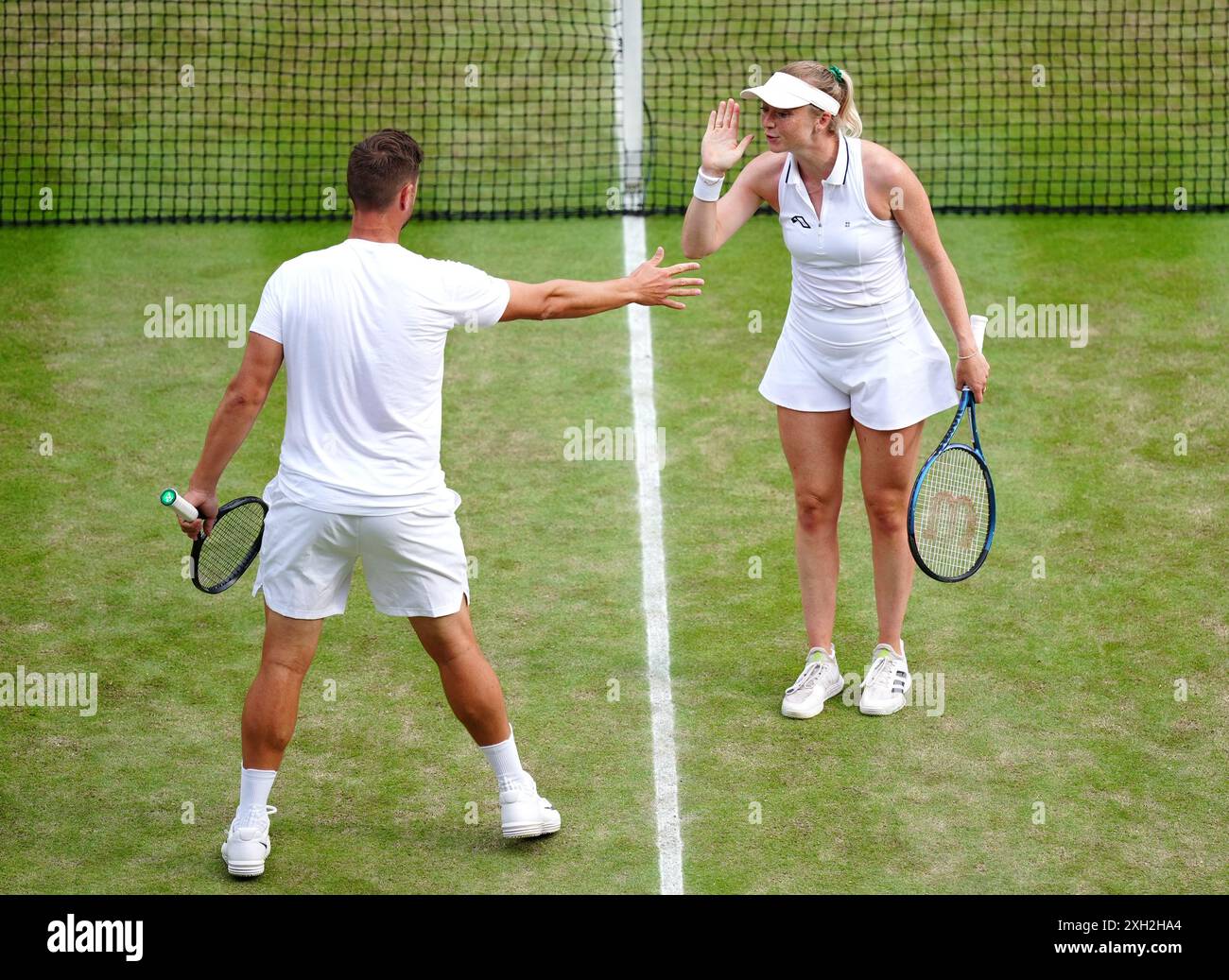Alicia Barnett and Marcus Willis celebrate winning a set during their ...