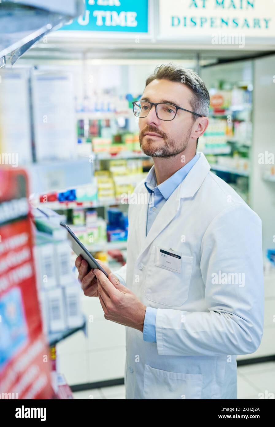 Doctor pharmacist checking information hi-res stock photography and ...