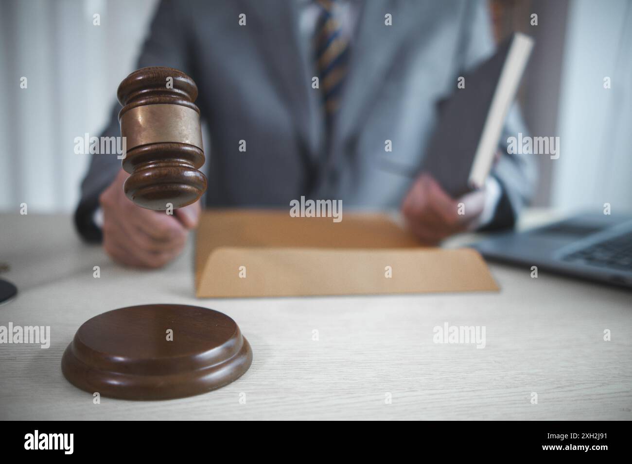 judge's gavel is placed on a table in the legal counsel's office and is ...