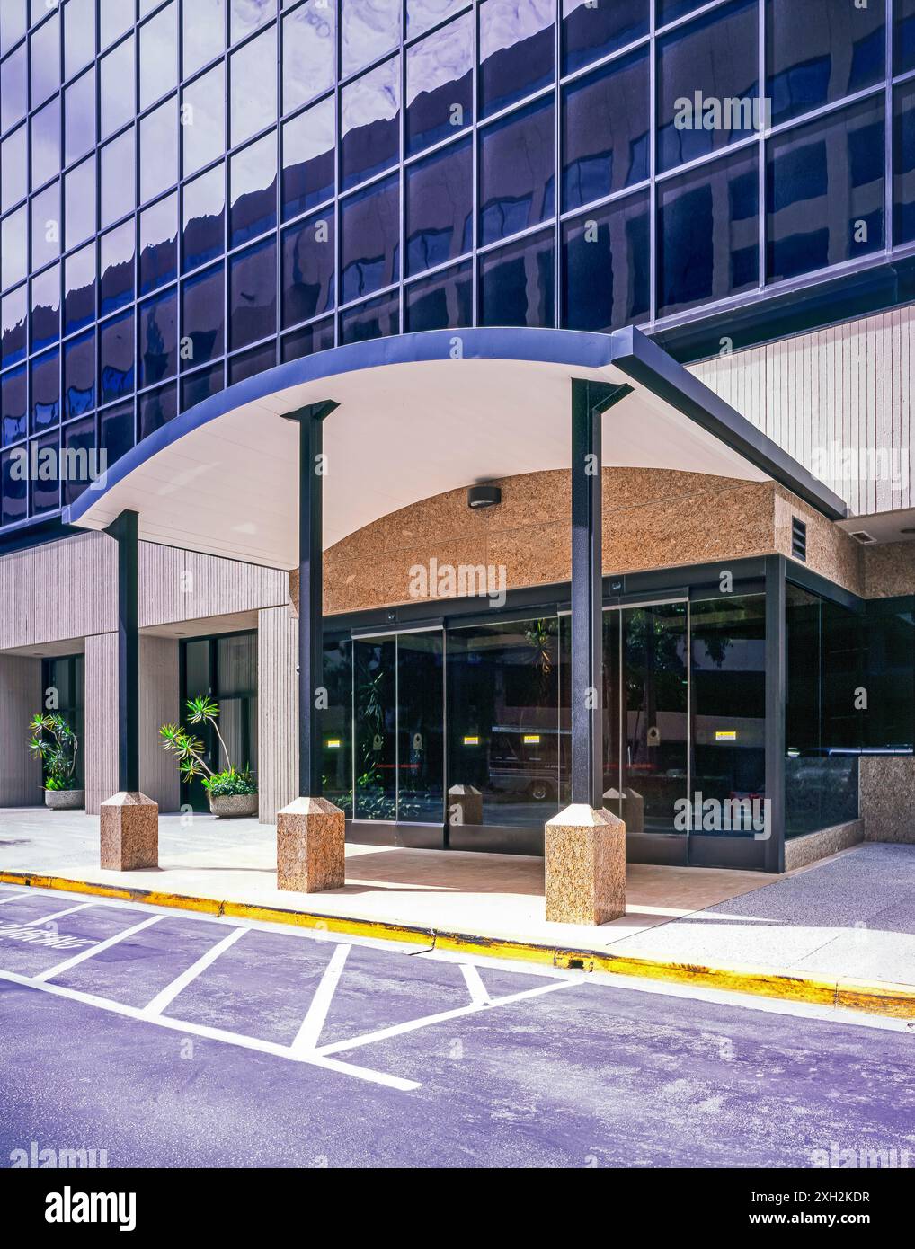 Corporate Exterior Architecture showing a front entrance with a curved ...