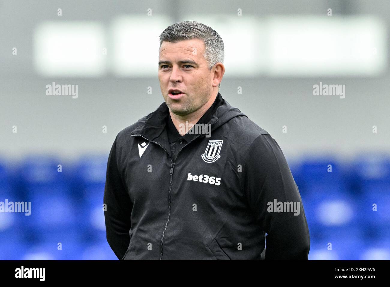 Steven Schumacher manager of Stoke City inspects the pitch ahead of the ...