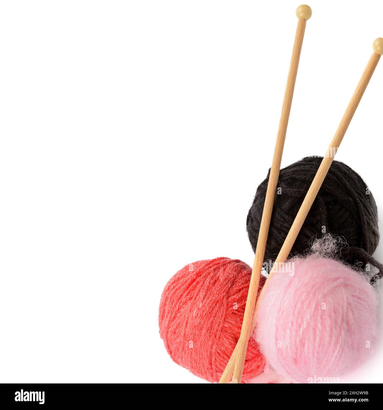 Balls of wool and knitting needles isolated on white background. Free ...