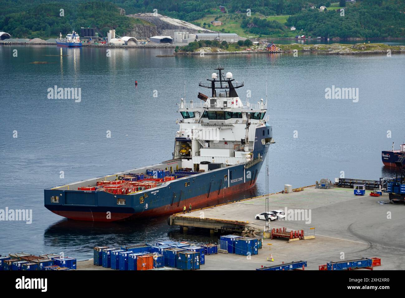 The standby safety vessel Troms Arcturus carefully maneuvers to dock at ...