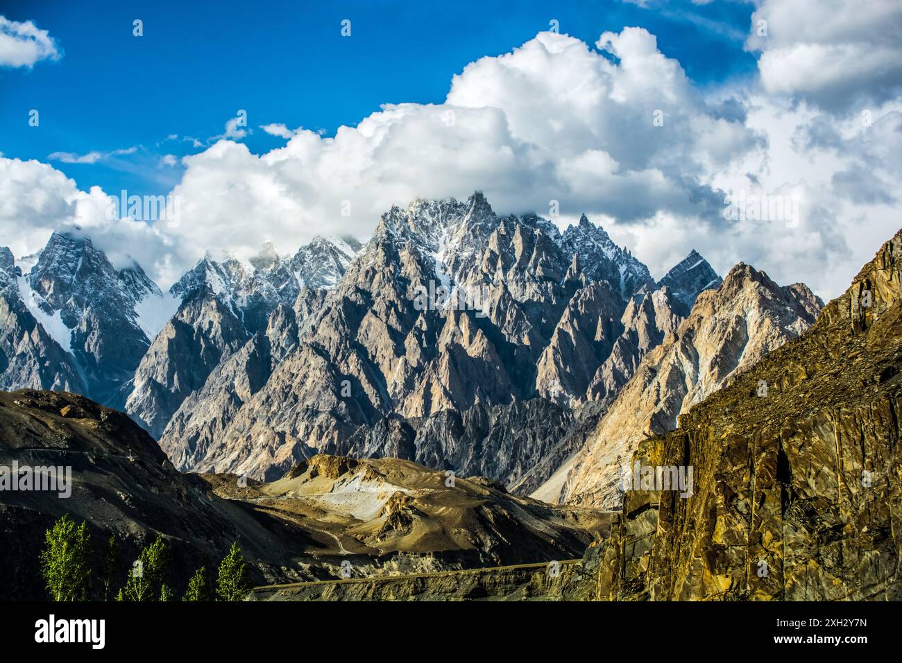 Tupopdan, also known as Passu Cones or Passu Cathedral, stands at 6,106 ...