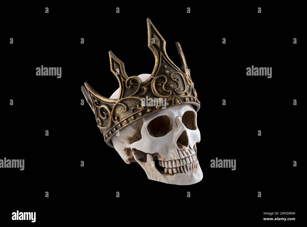 Human skull with ancient golden crown isolated on black background with ...
