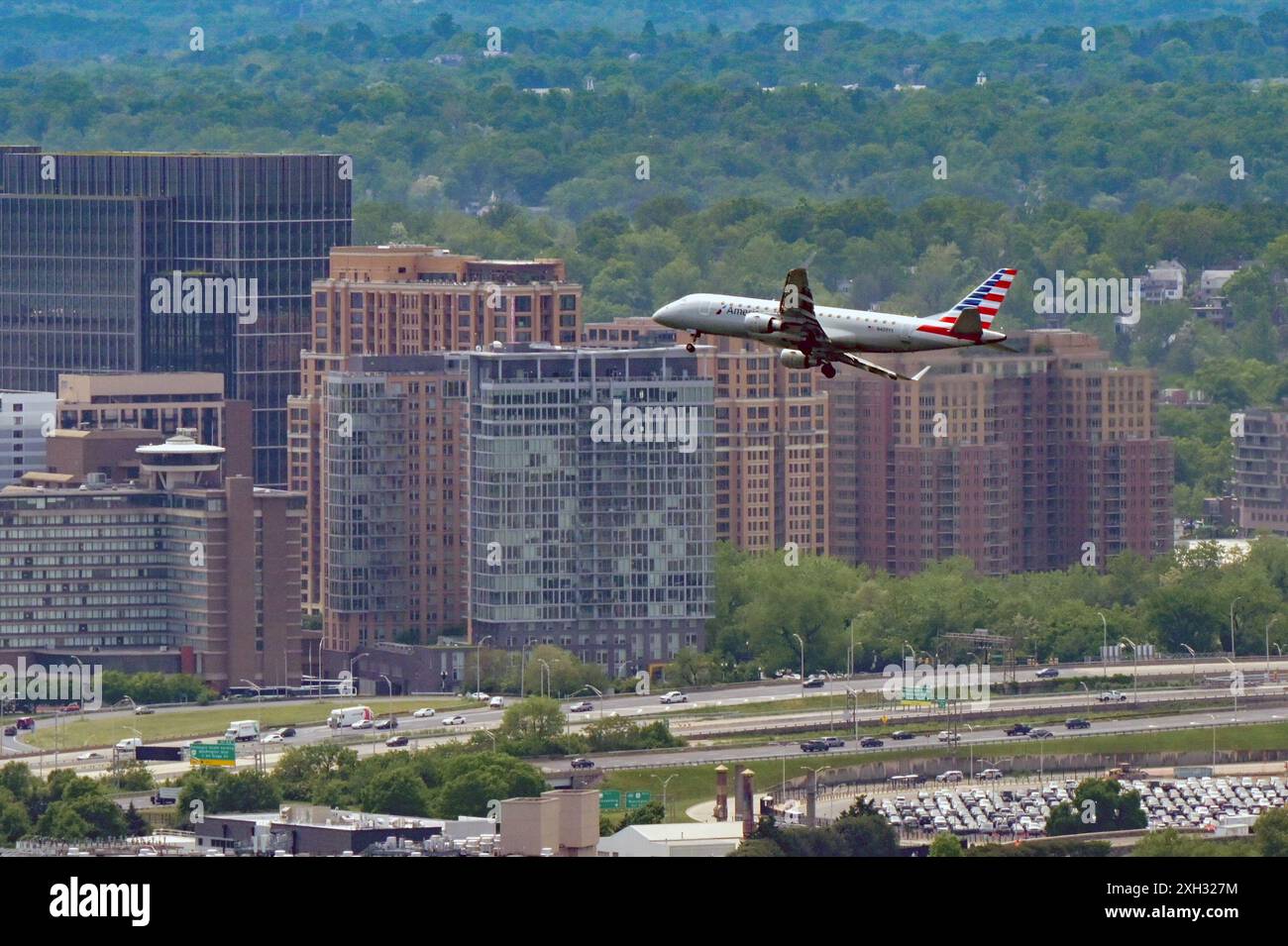 Washington DC, USA - 30 April 2024: American Airlines jet flying low ...