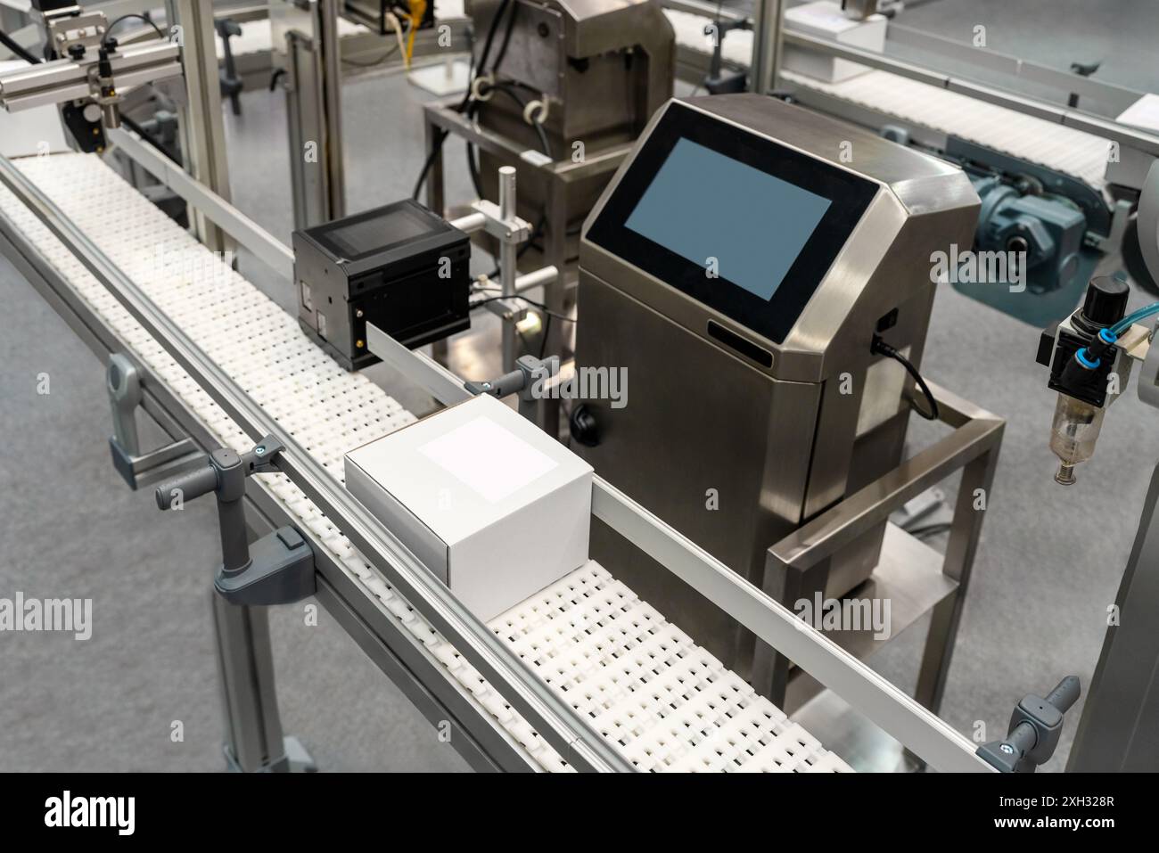 Cardboard box on the autonomous production line. Automatic sorting ...