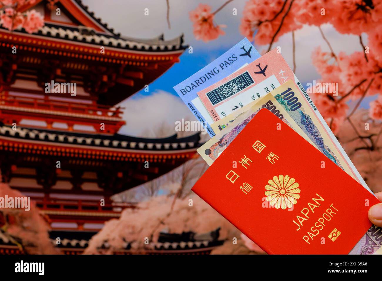 Tourist holds Japanese yen, Japan passport, tickets on background of ...