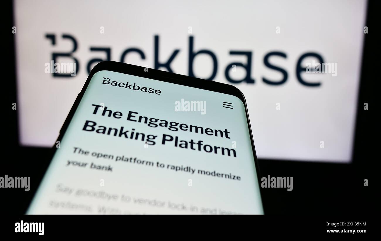 Mobile phone with website of Dutch fintech company Backbase B.V. in ...