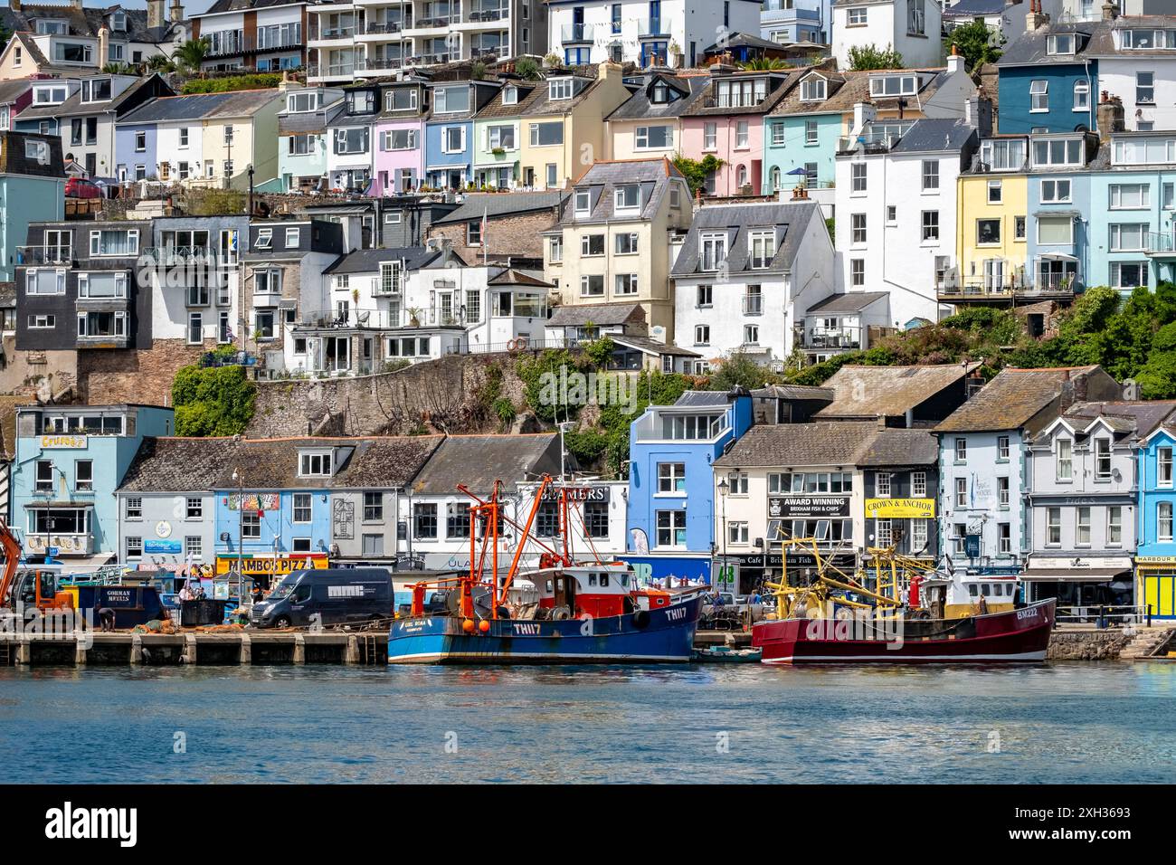 A long range zoom in shot across Brixham Harbour Stock Photo - Alamy