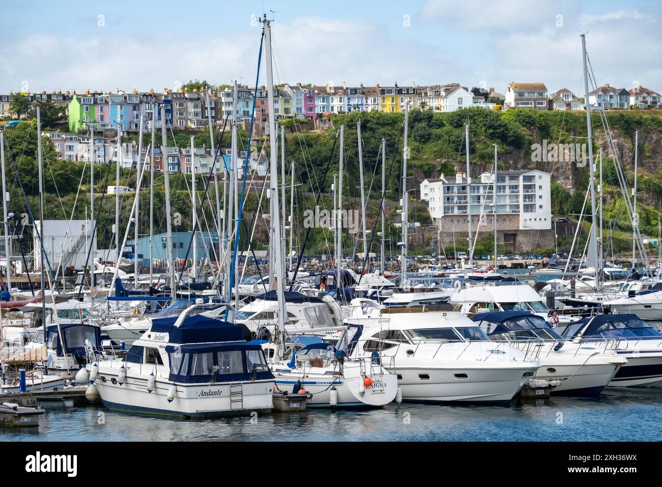 Long range zoom in shot across Brixham Harbour Stock Photo - Alamy