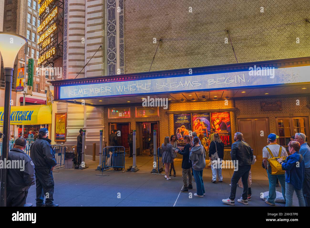 Evening view of people queuing outside Shubert Theatre on Broadway in ...