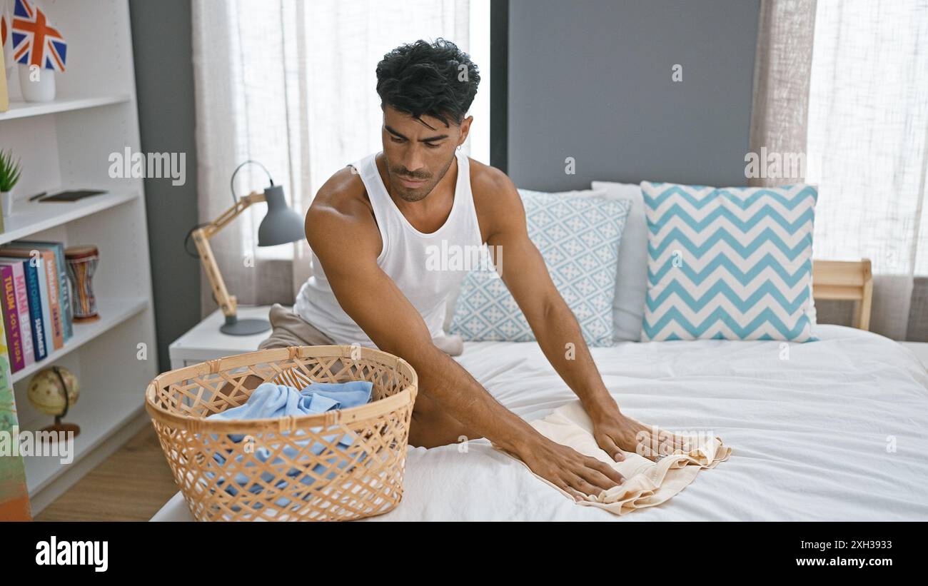 Folding clothes laundry male hi-res stock photography and images - Alamy