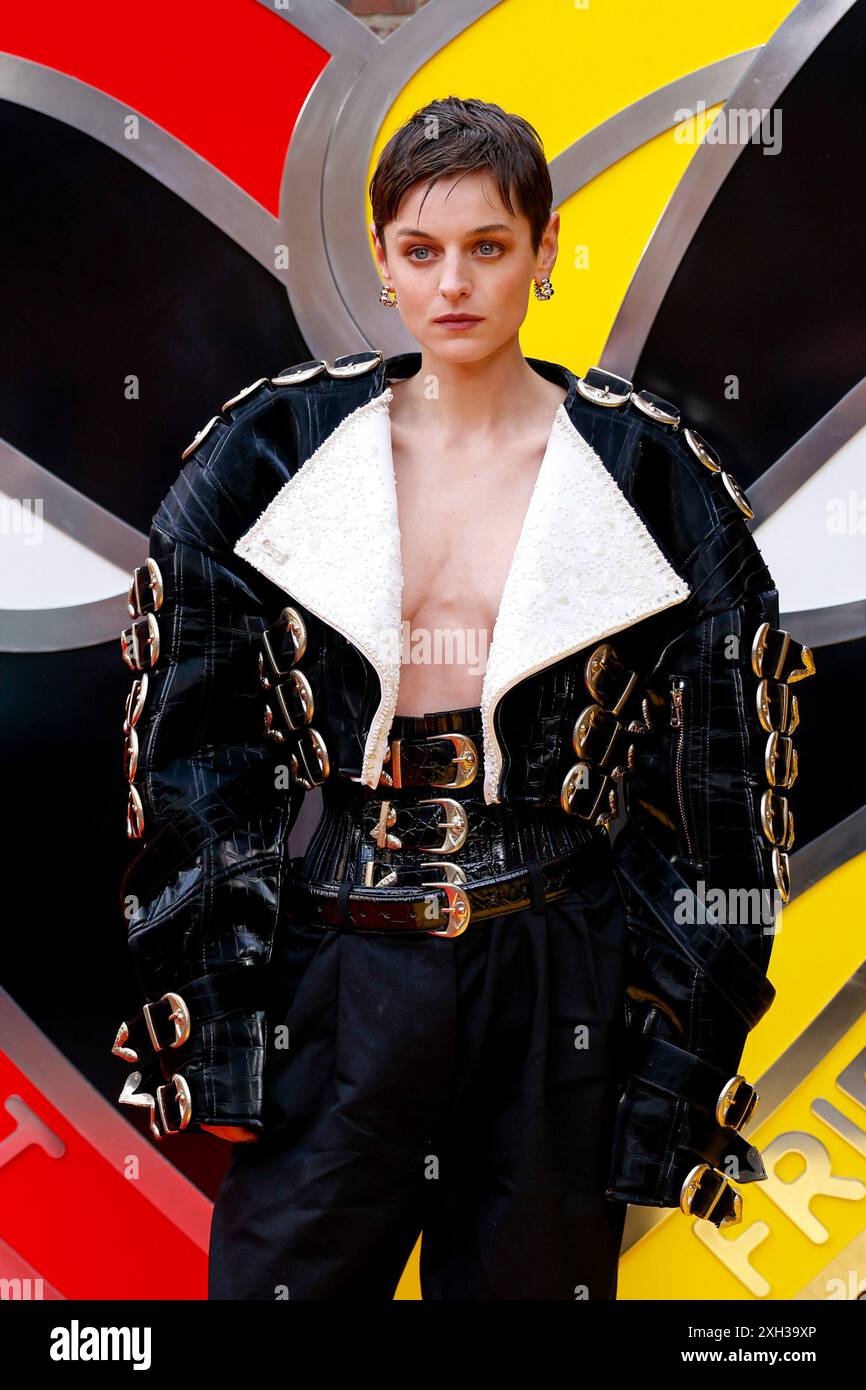 Emma Corrin poses for photographers upon arrival at the screening of ...