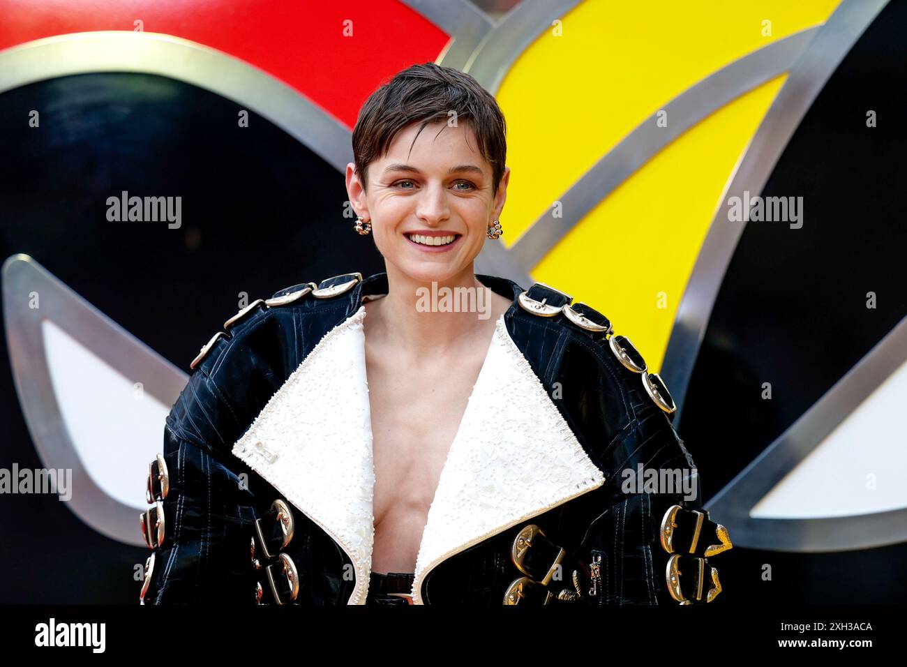Emma Corrin poses for photographers upon arrival at the screening of ...