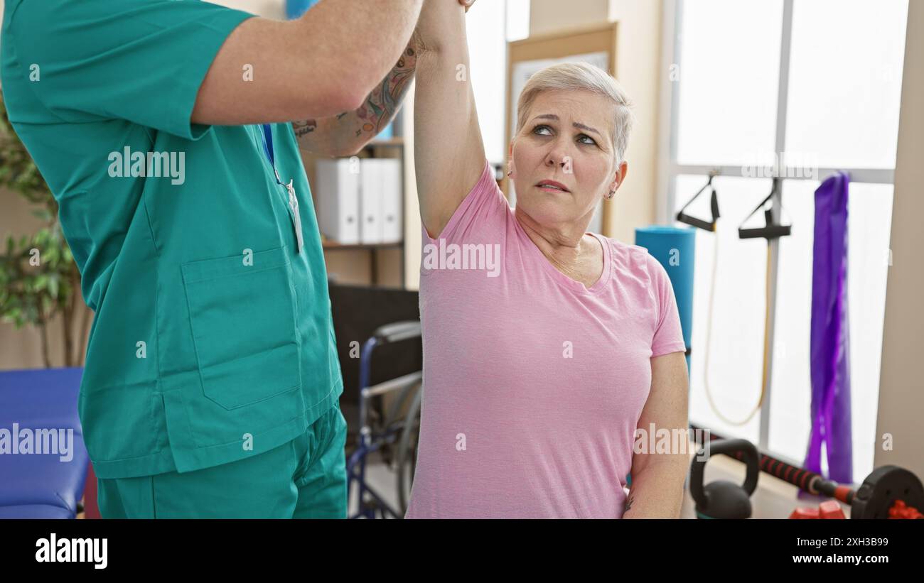 Senior woman receiving physiotherapy hi-res stock photography and ...
