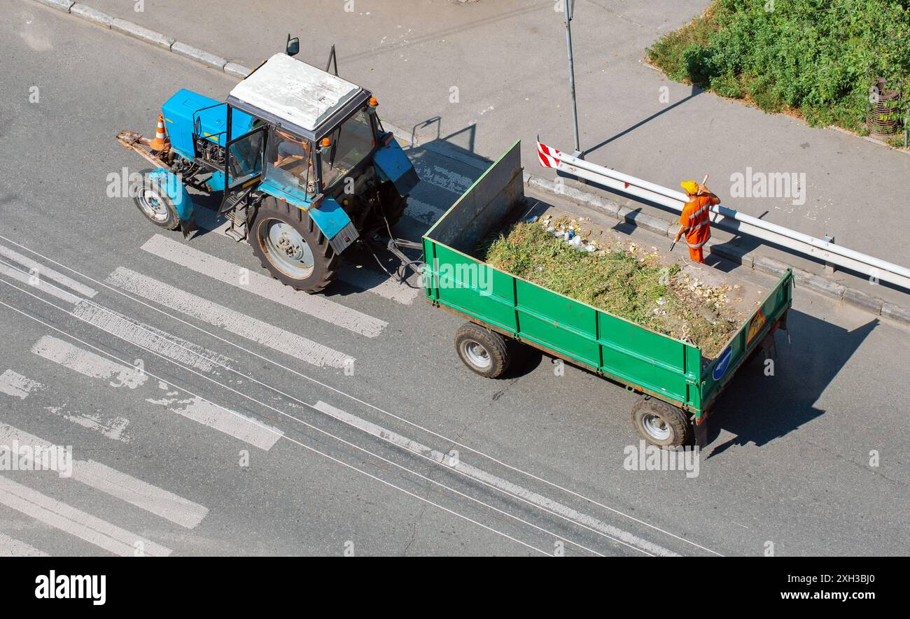 old tractor with a trailer for cleaning street garbage, top view Stock ...