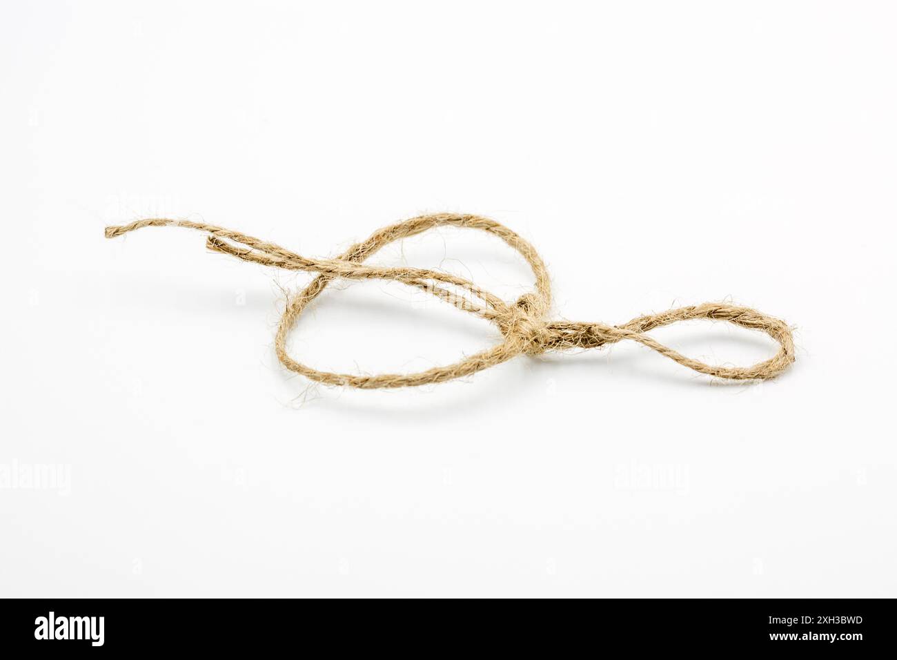 Thick felt rope tied in a noose closeup on a white Stock Photo - Alamy