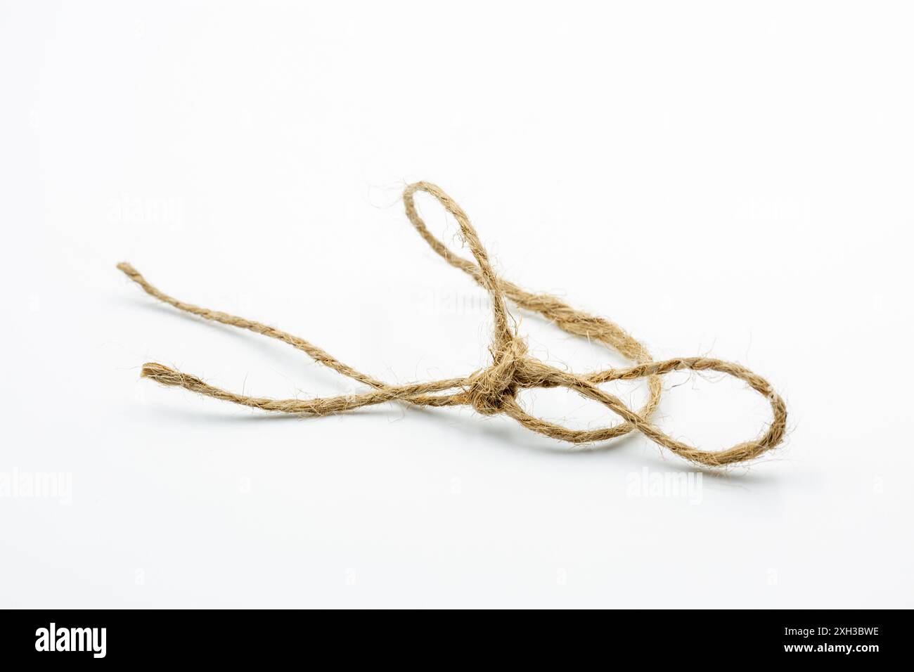 Thick felt rope tied in a noose closeup on a white Stock Photo - Alamy
