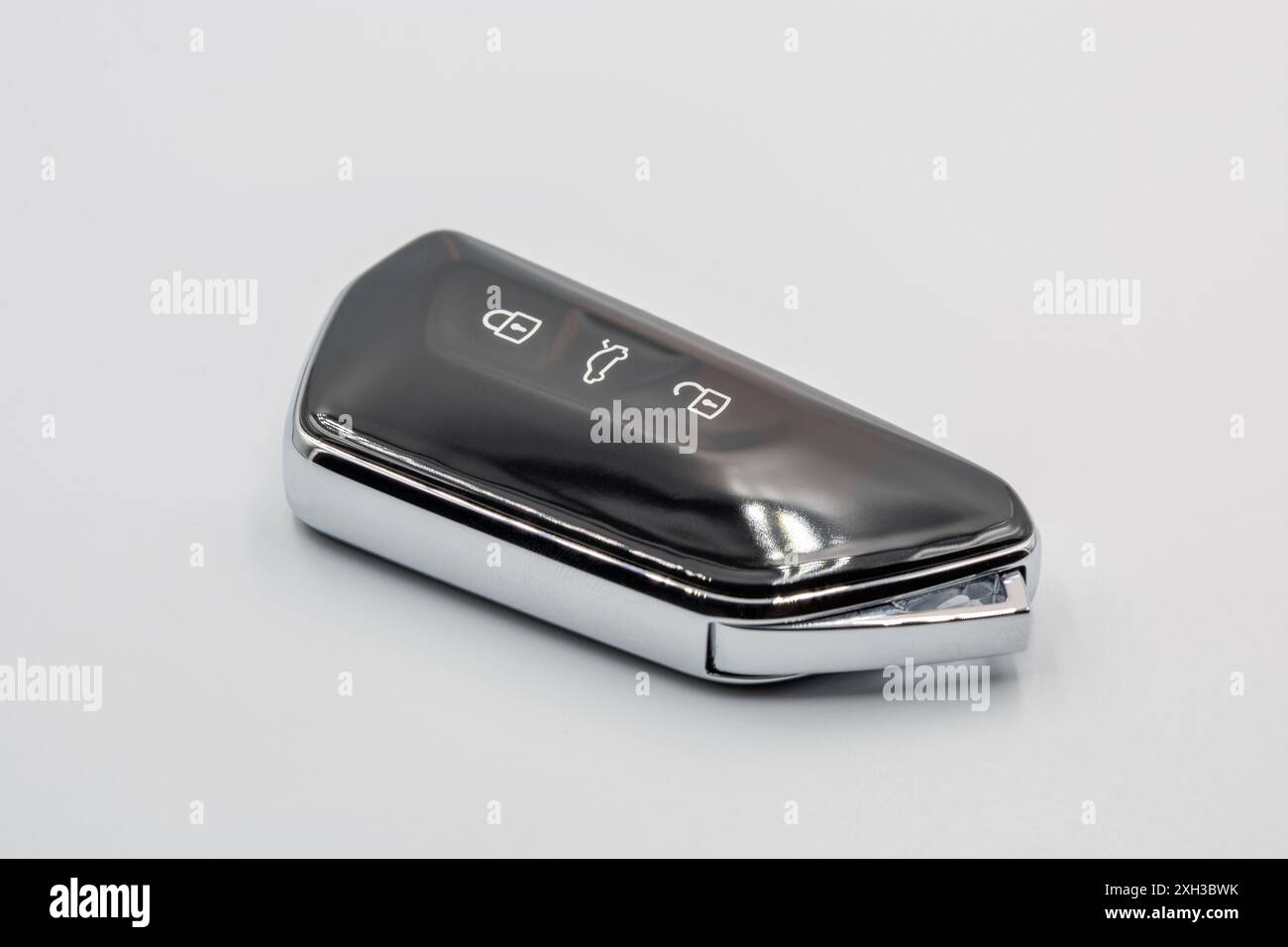 Modern new car proximity key closeup on white Stock Photo - Alamy