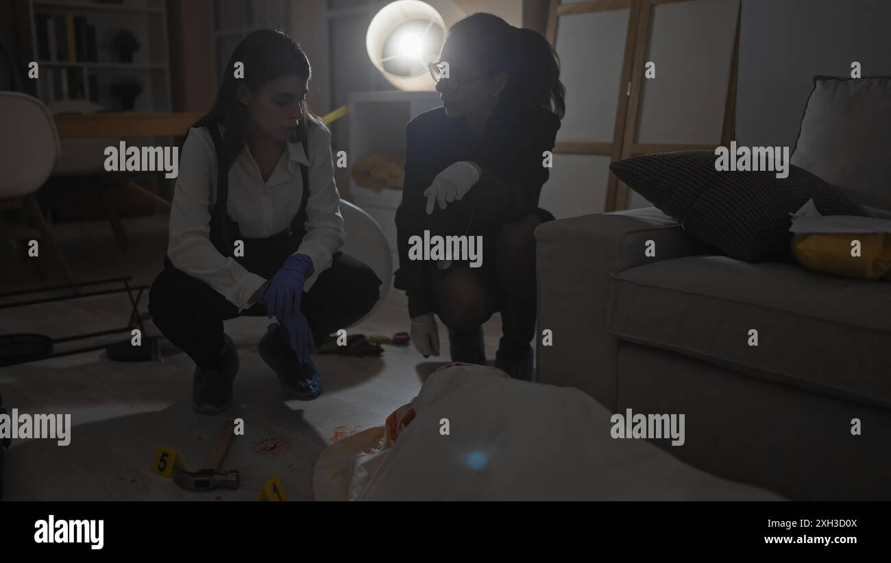 Two women detectives analyze a crime scene indoors with evidence and a ...