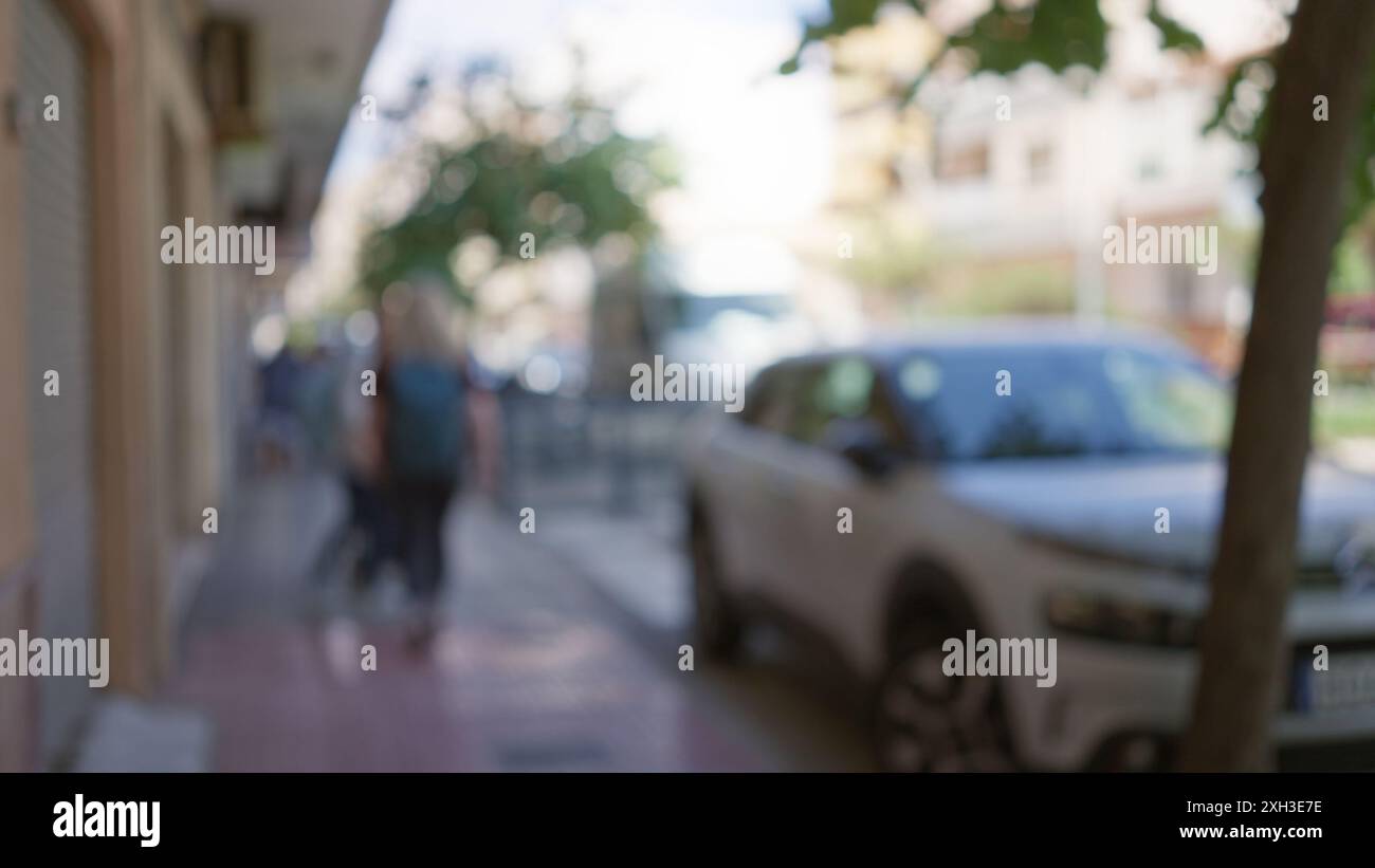 Blurred background of an outdoor city street with out-of-focus people ...