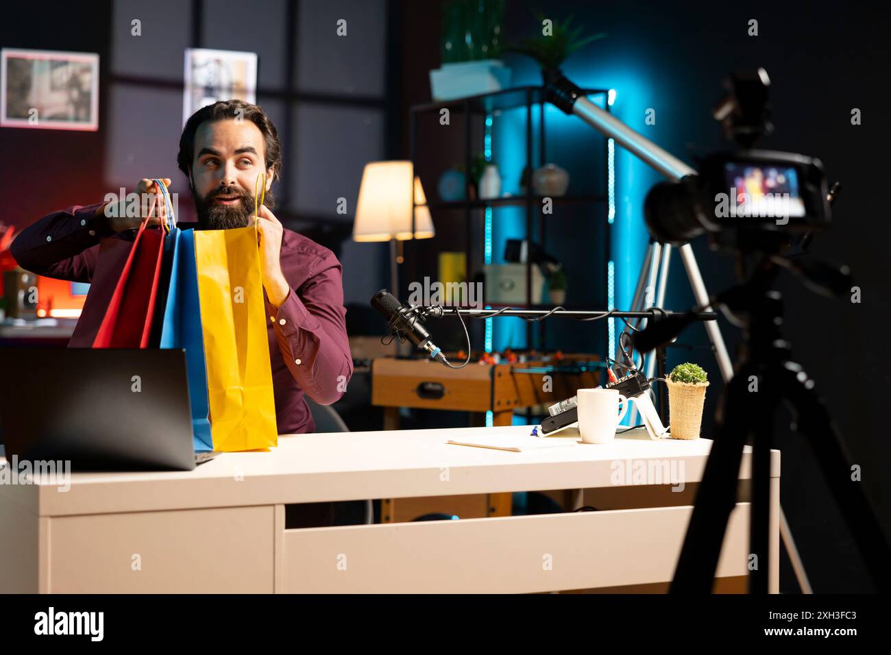 Excited content creator filming fashion vlog using professional camera ...