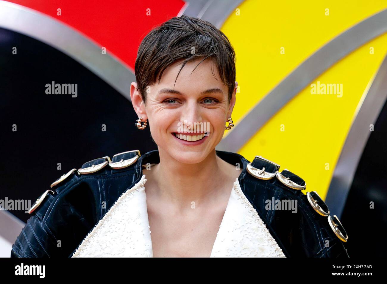 Emma Corrin poses for photographers upon arrival at the screening of ...