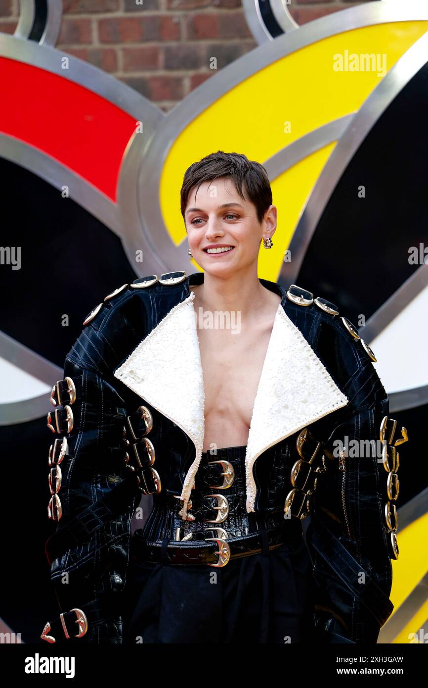 Emma Corrin poses for photographers upon arrival at the screening of ...