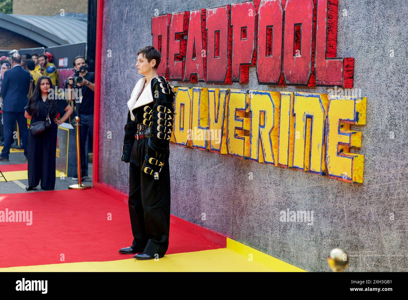 Emma Corrin poses for photographers upon arrival at the screening of ...