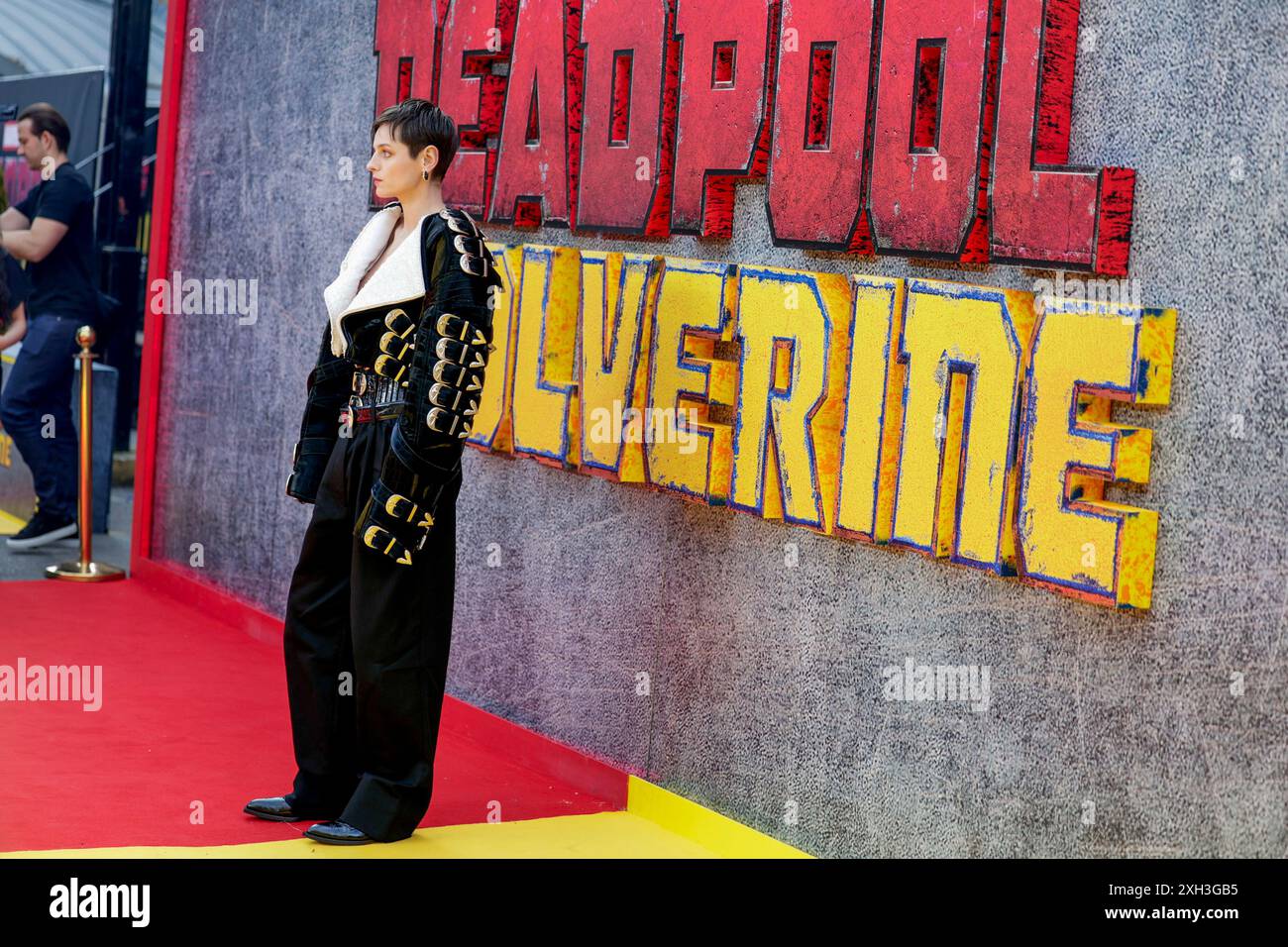 Emma Corrin poses for photographers upon arrival at the screening of ...