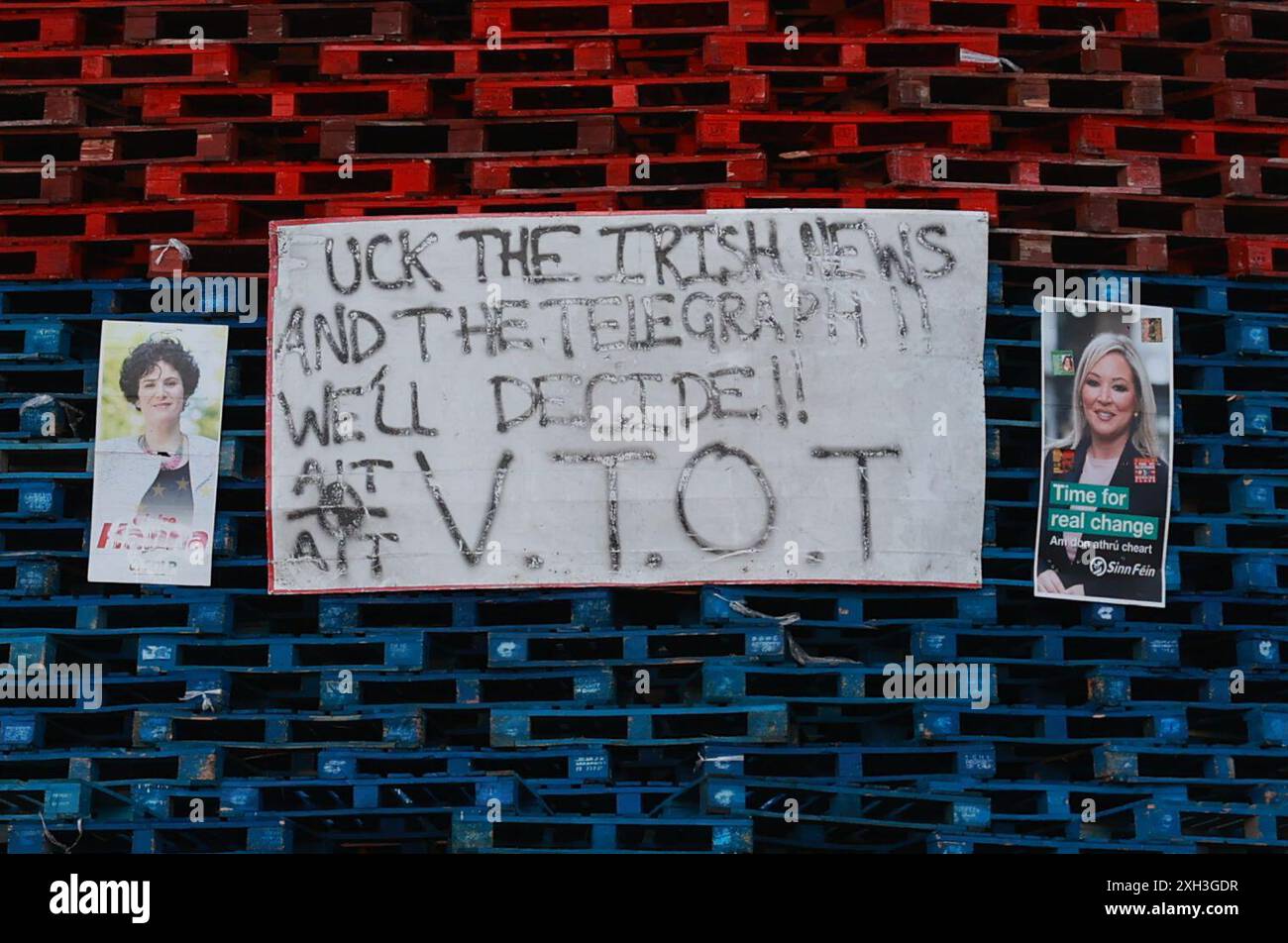 EDITORS NOTE: LANGUAGE A bonfire with election posters of SDLP MP ...