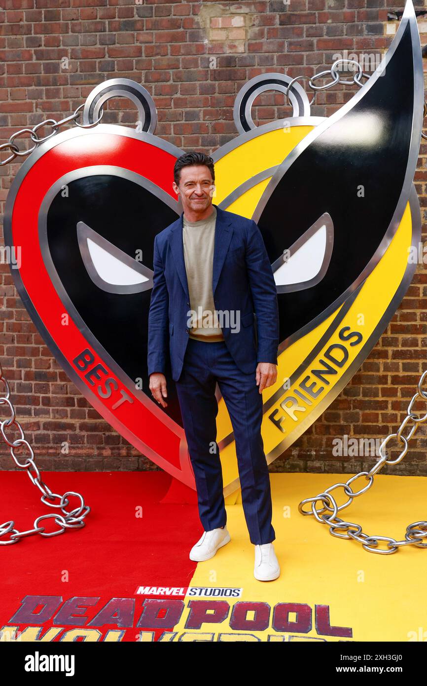 Hugh Jackman poses for photographers upon arrival at the screening of ...