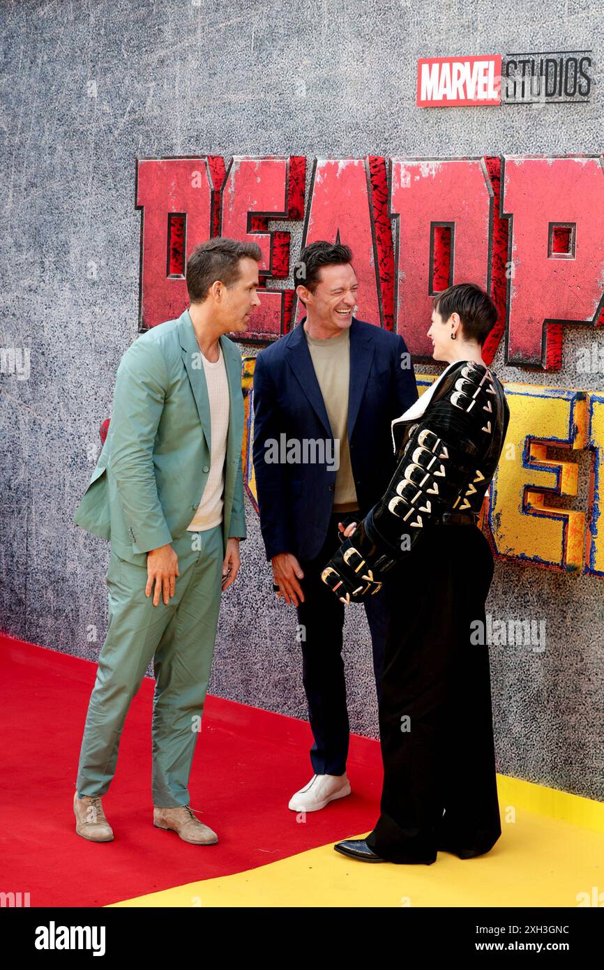 Ryan Reynolds, from left, Hugh Jackman, and Emma Corrin pose for ...