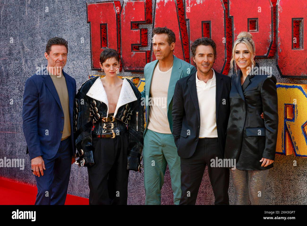 Ryan Reynolds, from left, Hugh Jackman, Emma Corrin, director Shawn ...